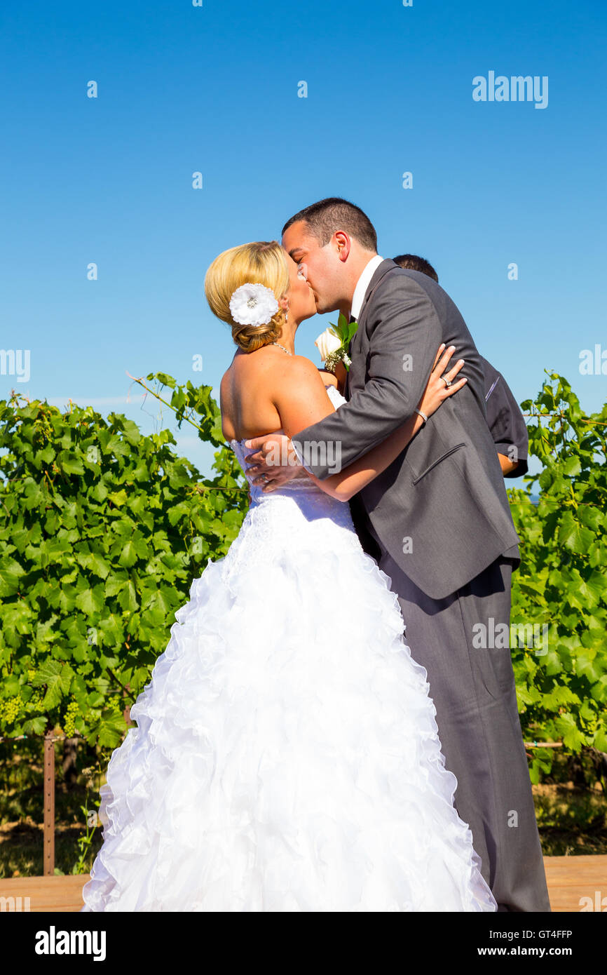 Bride and Groom First Kiss Ceremony Stock Photo - Alamy