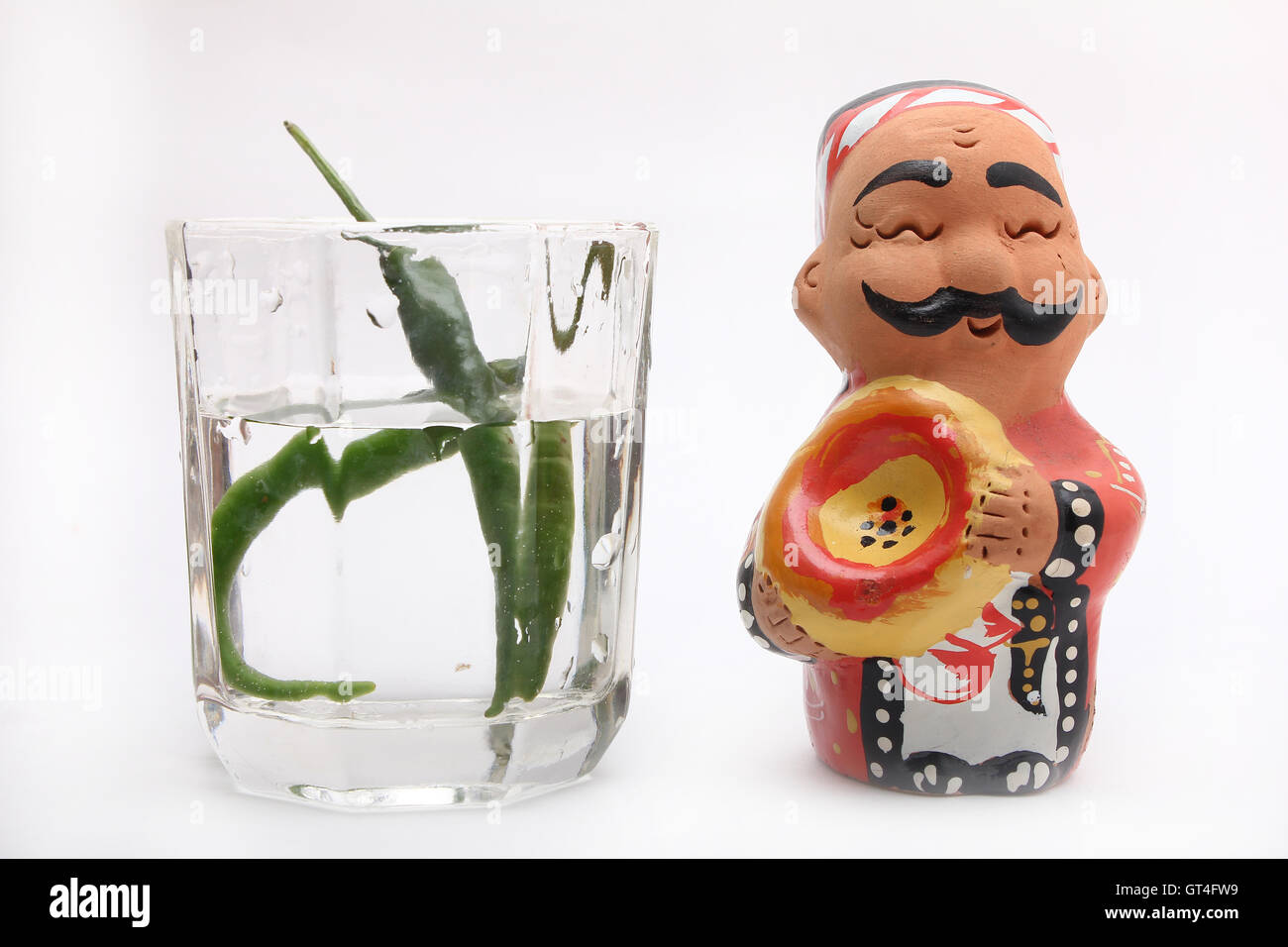 chilli with statue Stock Photo - Alamy