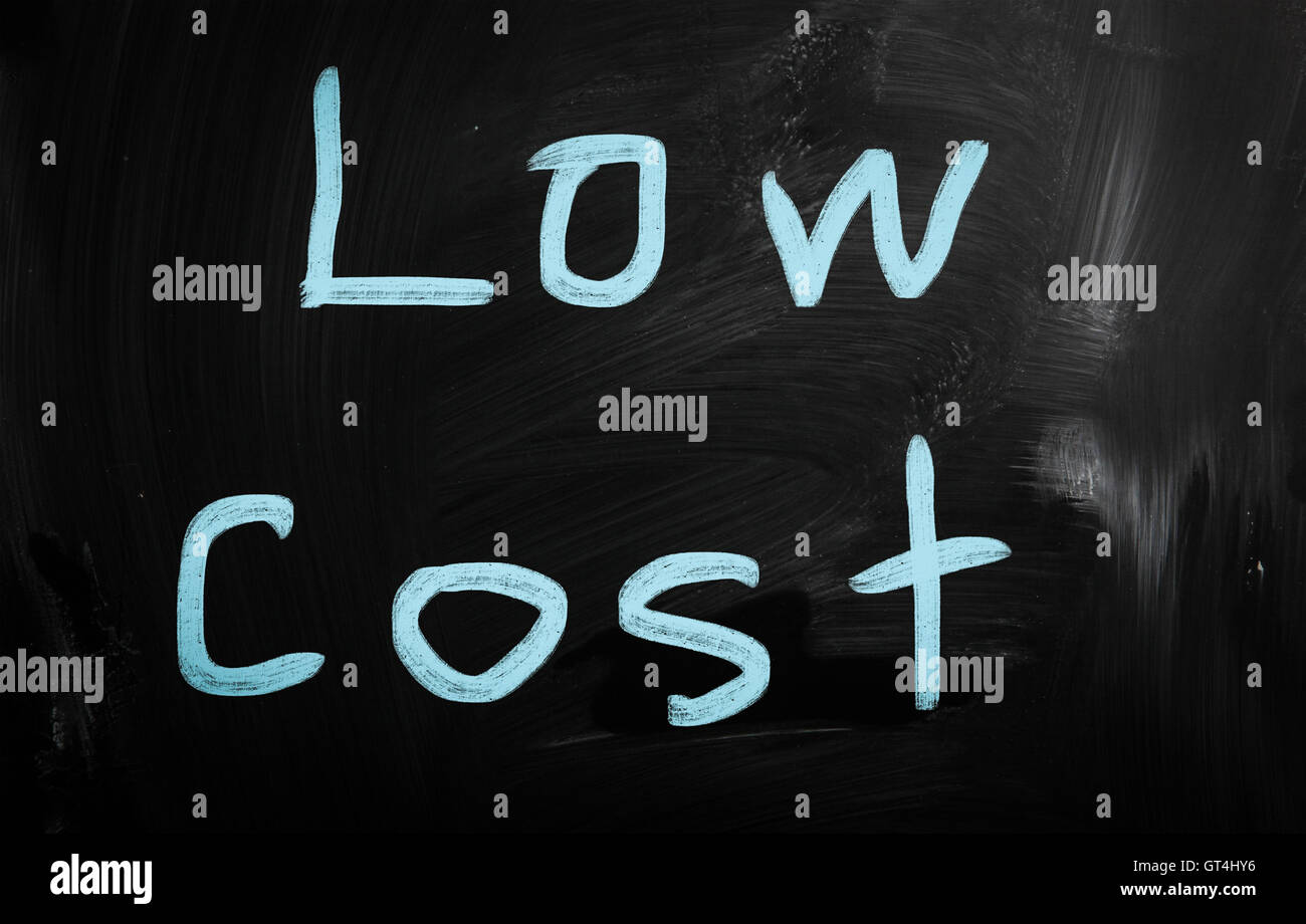 Low cost handwritten with white chalk on a blackboard Stock Photo - Alamy