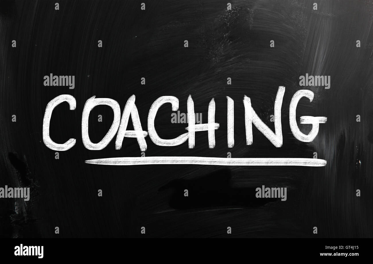 Coaching handwritten with chalk on a blackboard Stock Photo - Alamy