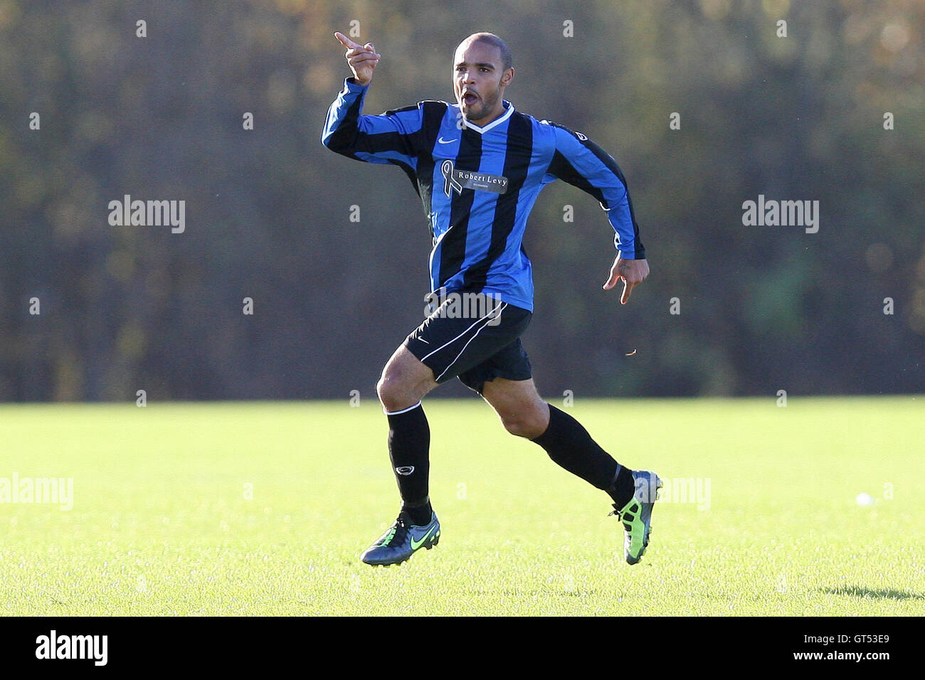 Hackney Borough celebrate their third goal - Black Meteors (yellow ...