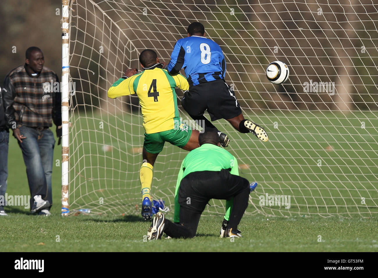 Hacknery Borough score their fourth goal - Black Meteors (yellow/green ...
