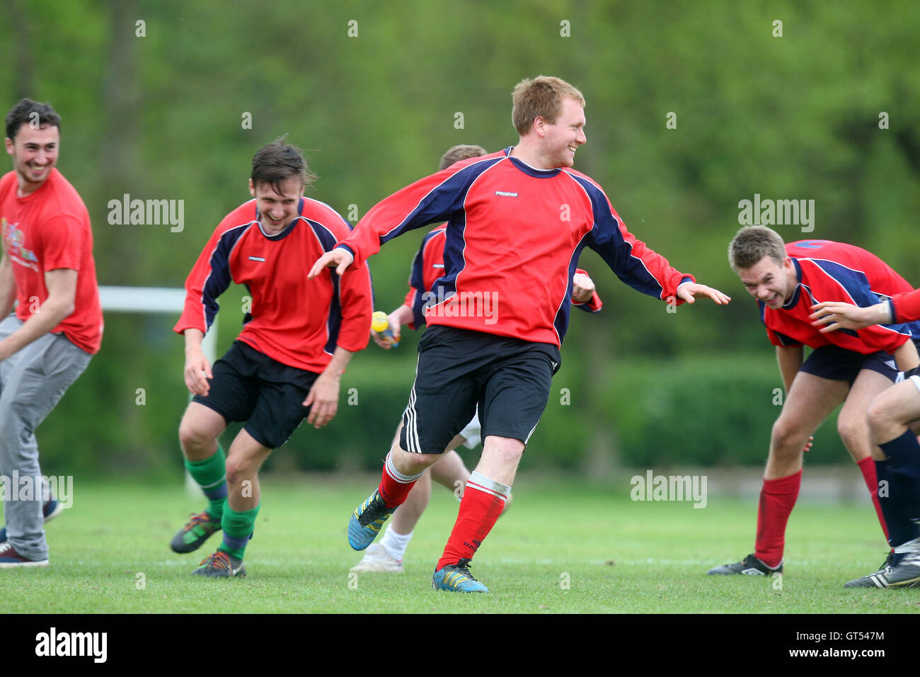 Top Red celebrate scoring the winning penalty in the penalty shoot-out ...