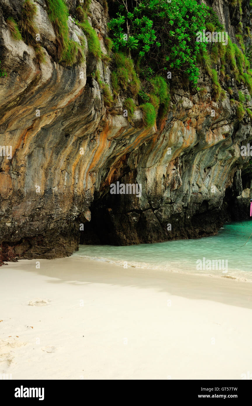 A weathered rock formation on the waters of Maya Bay located on Phi Phi ...