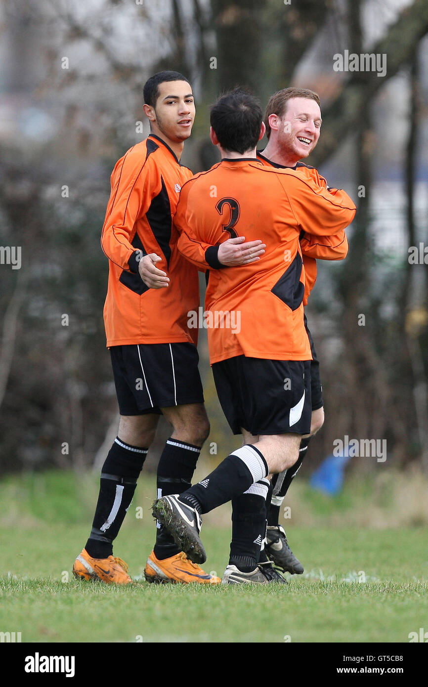 FC Metwin celebrate their third goal - FC Metwin (orange) vs Albion ...