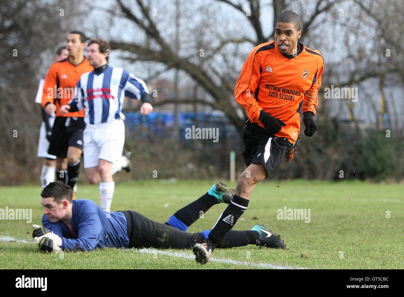 FC Metwin score their first goal and celebrate - FC Metwin (orange) vs ...
