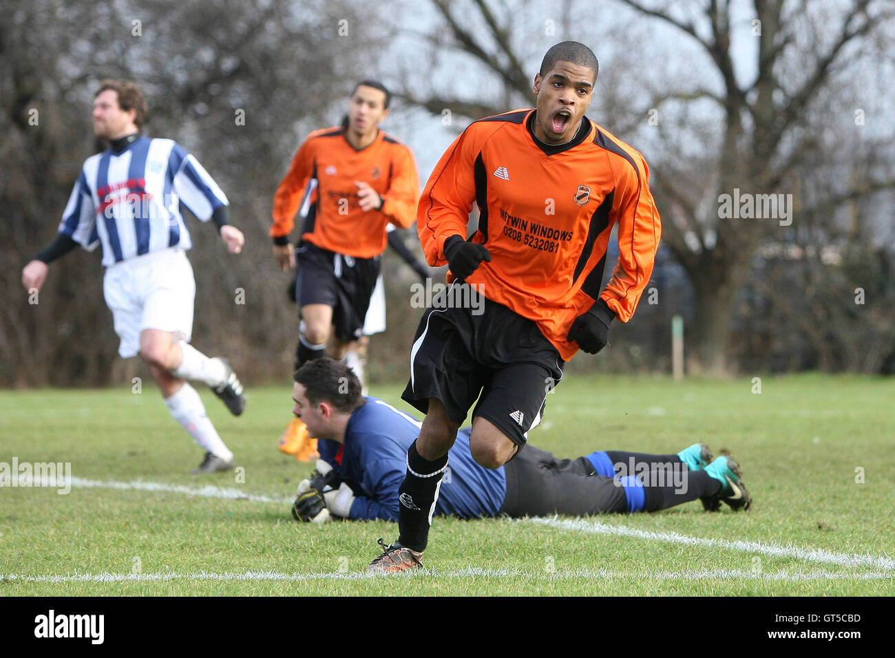 FC Metwin score their first goal and celebrate - FC Metwin (orange) vs ...