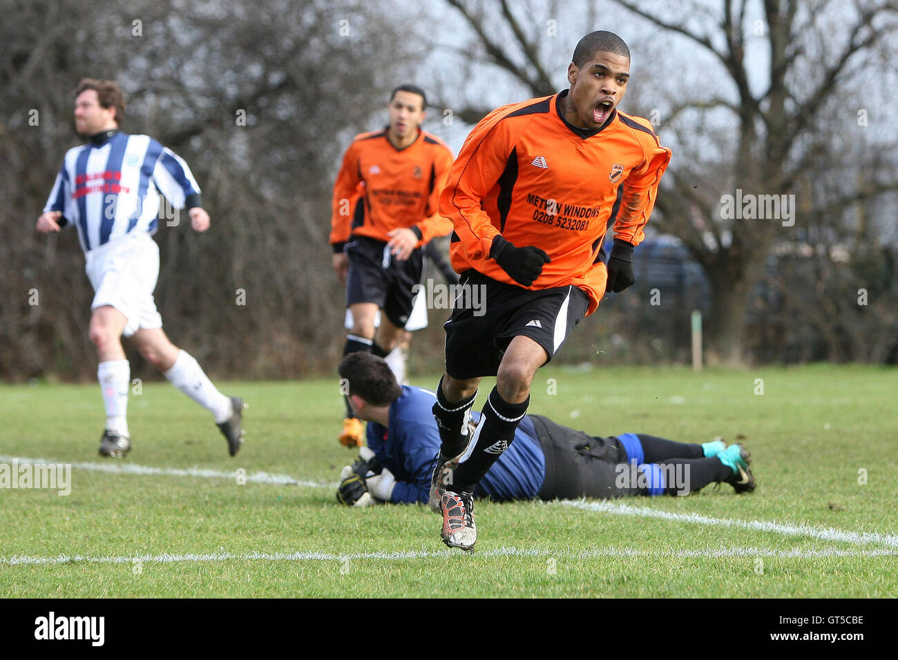 FC Metwin score their first goal and celebrate - FC Metwin (orange) vs ...