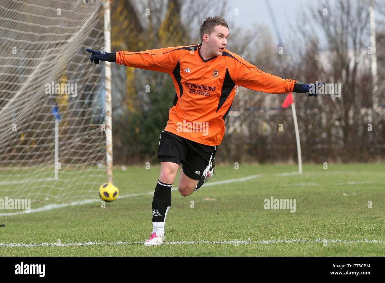 FC Metwin score their second goal and celebrate - FC Metwin (orange) vs ...
