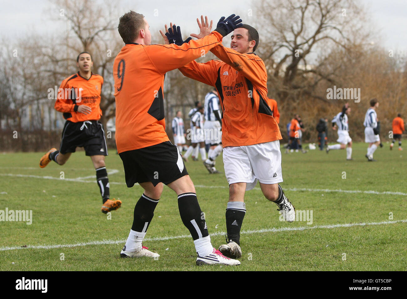 FC Metwin score their second goal and celebrate - FC Metwin (orange) vs ...