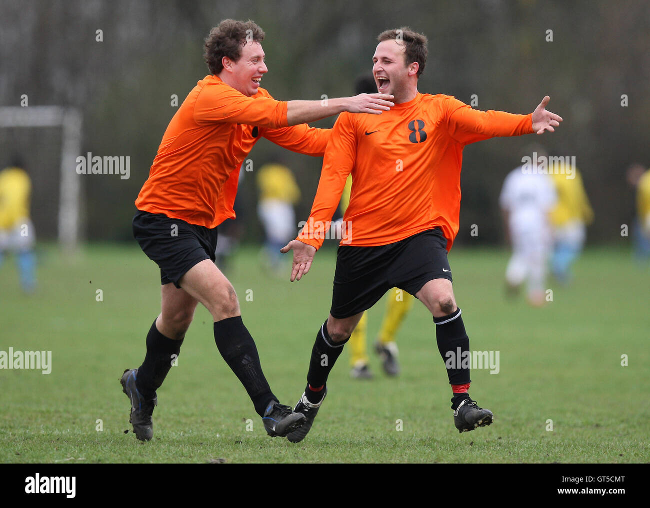 Comet celebrate their third and winning goal - FC Polit (yellow) vs ...