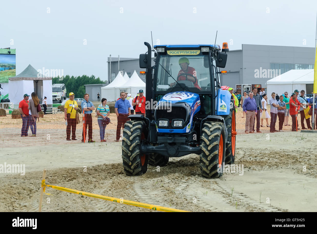 Tractor operator on special track for slalom Stock Photo - Alamy