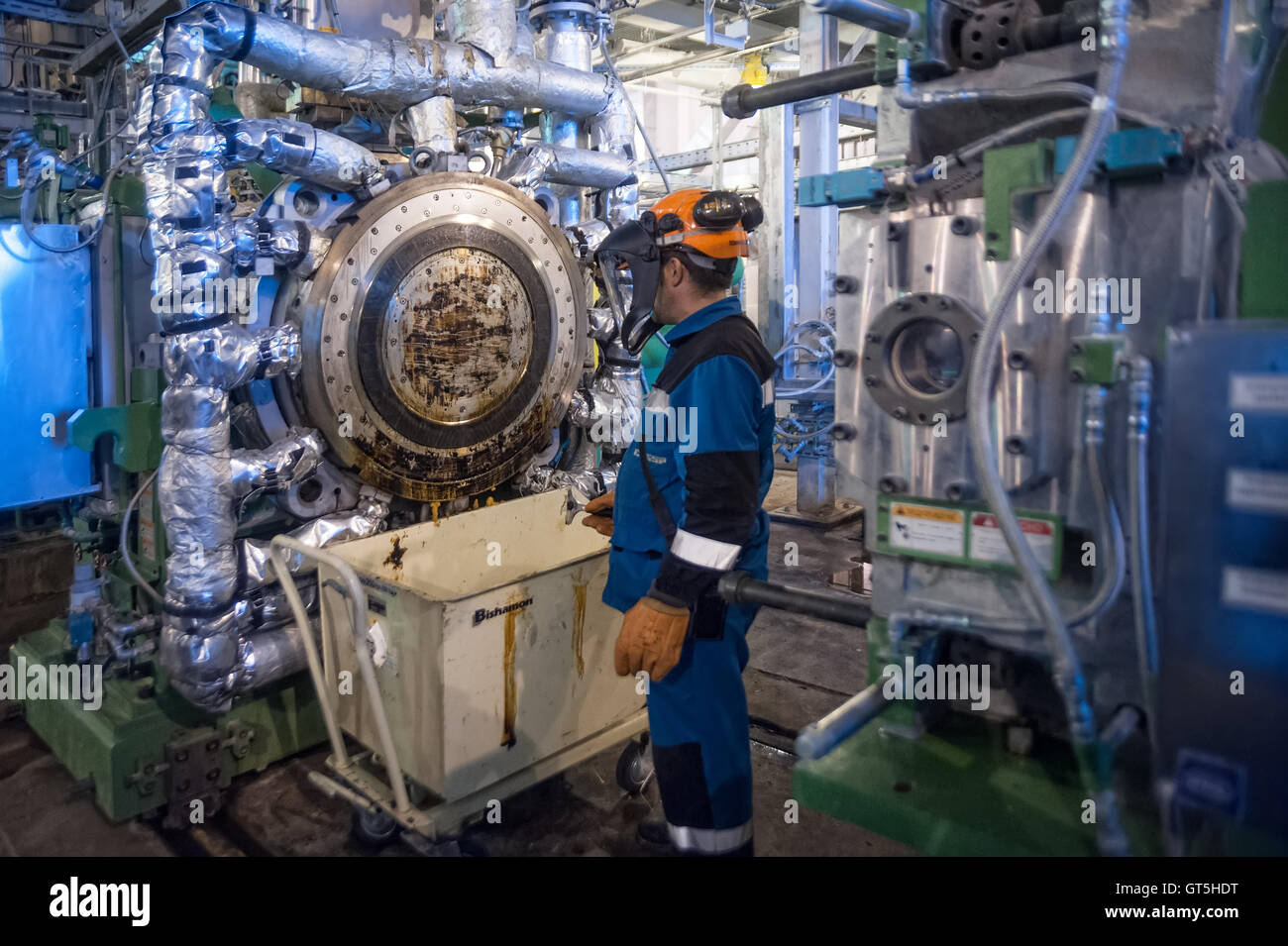 Industrial mechanic cleaning extruder machine Stock Photo - Alamy