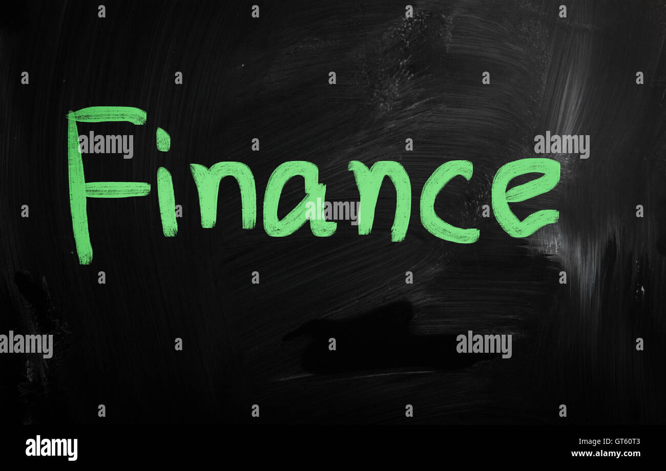 Finance handwritten with white chalk on a blackboard Stock Photo - Alamy