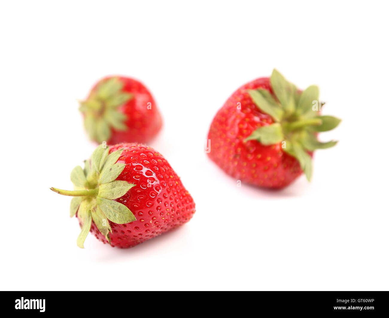 Four strawberries Cut Out Stock Images & Pictures - Alamy