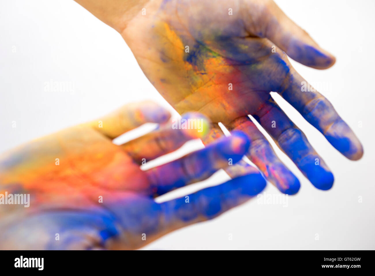 female hands colored powder Stock Photo - Alamy