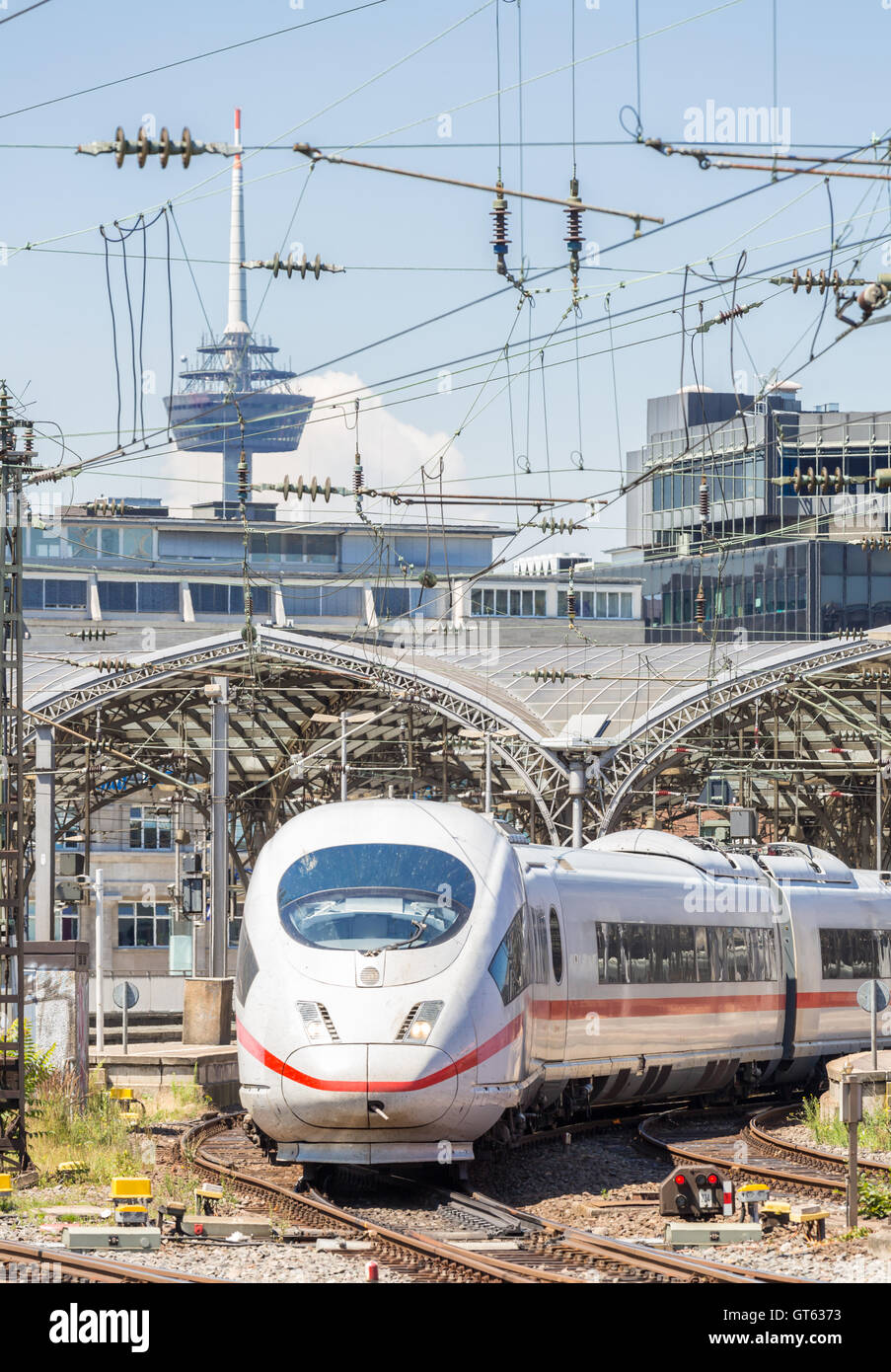 white train depart from the station Cologne Germany Stock Photo - Alamy