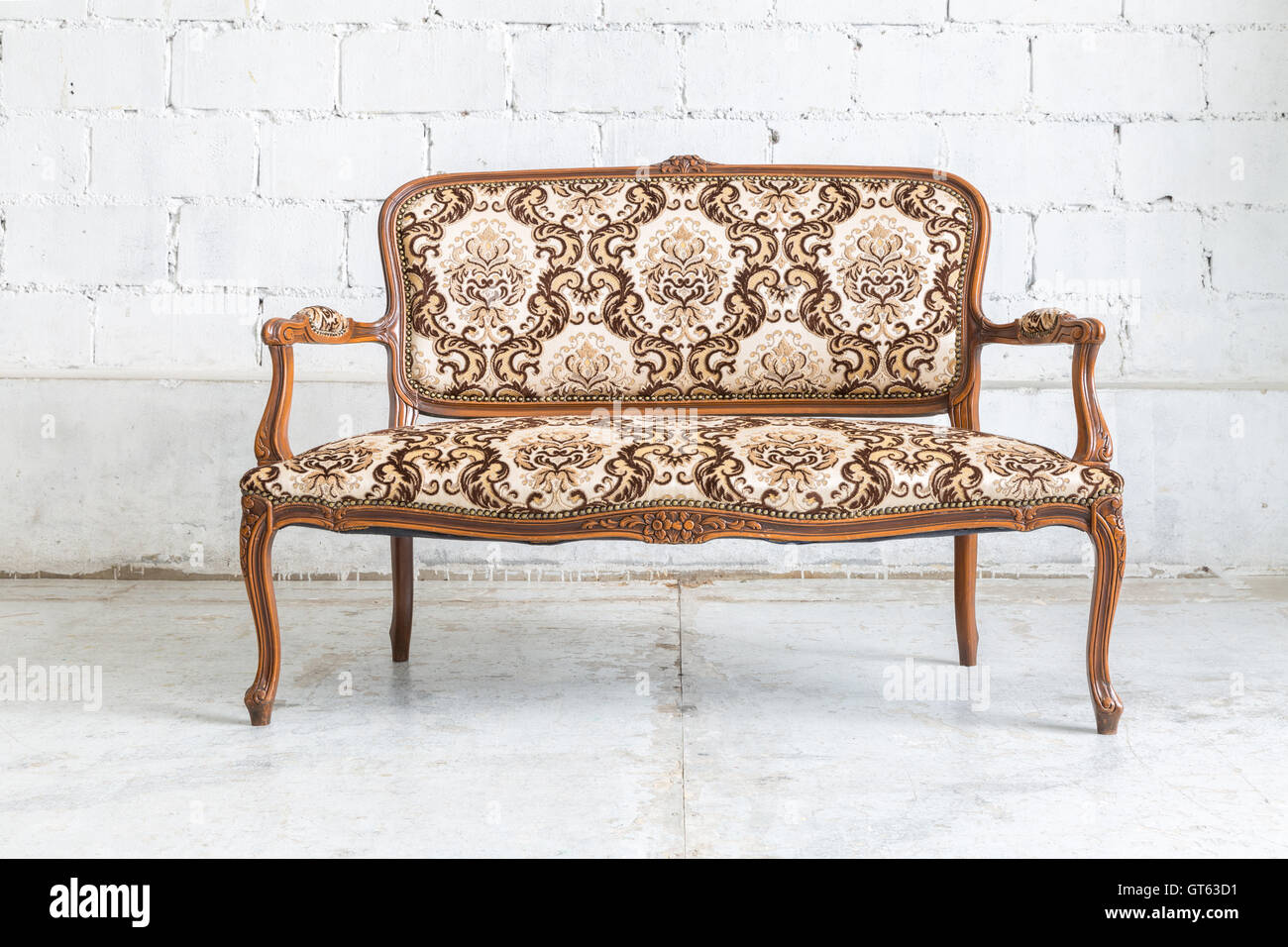Brown Classical style sofa couch in vintage room Stock Photo - Alamy