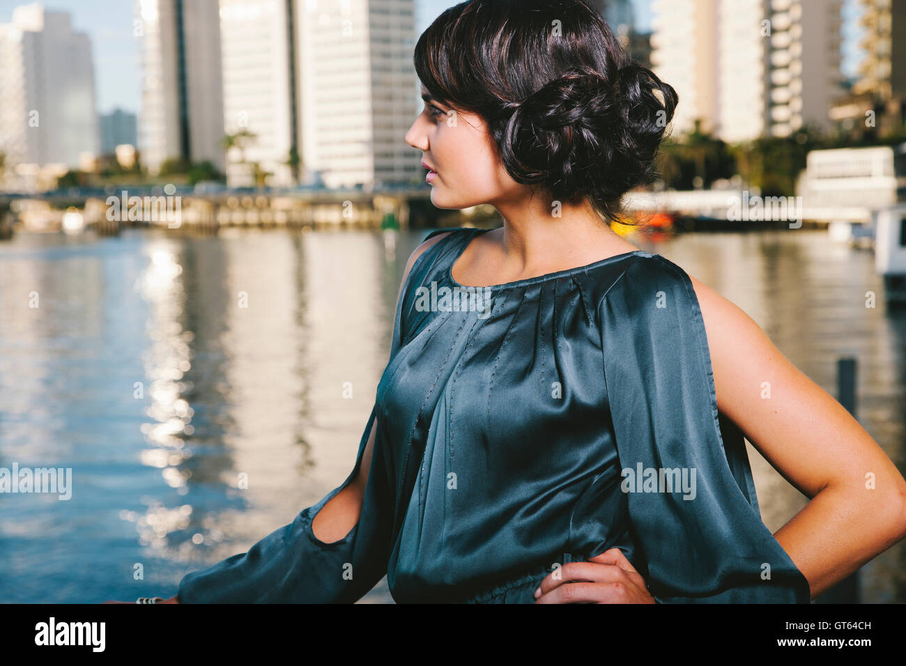 pretty lady looking across river Stock Photo - Alamy