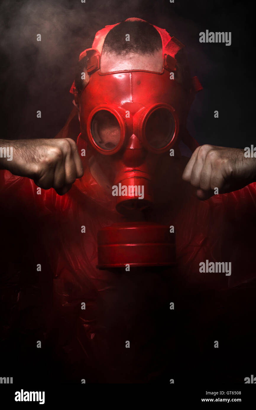 Chemical concept, man with red gas mask Stock Photo - Alamy