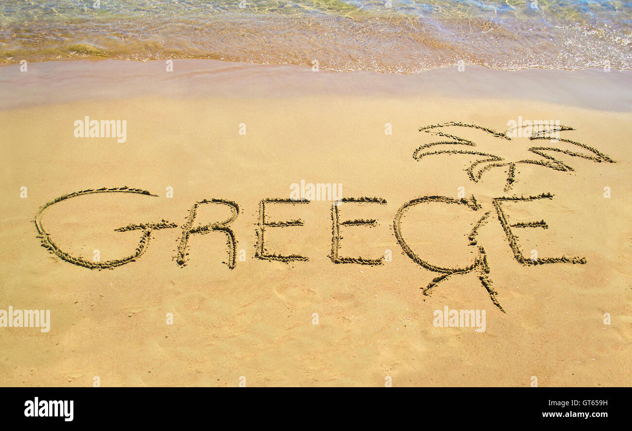 Greece written on sand - beach note icon Stock Photo - Alamy