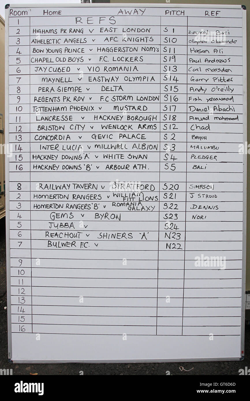 A large board displays the Sunday morning football fixtures at the ...