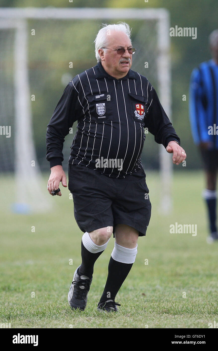 Ted Gore in refereeing action - Highams Park Rangers (yellow) vs ...
