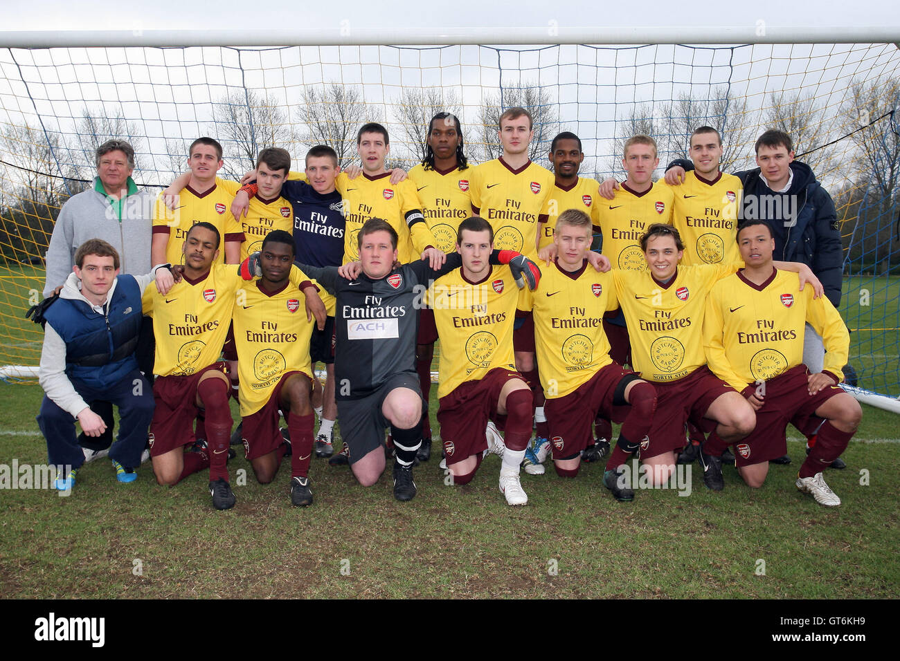 Mustard FC players pose for a team photo - Chapel Old Boys (blue) vs ...