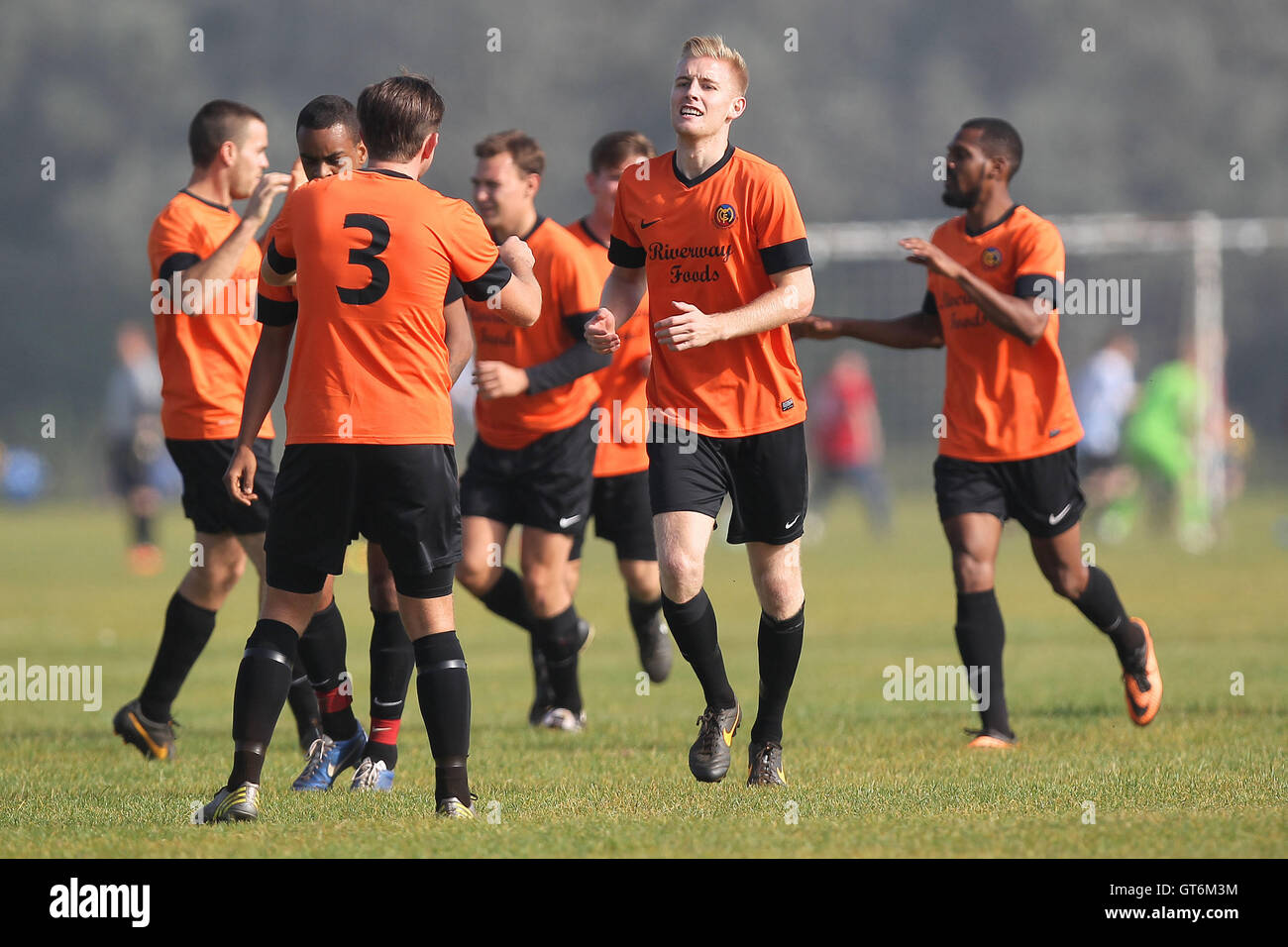 Mustard celebrate their first goal - New Kuba (red/white) vs Mustard ...