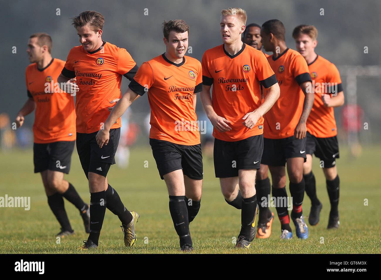 Mustard celebrate their first goal - New Kuba (red/white) vs Mustard ...