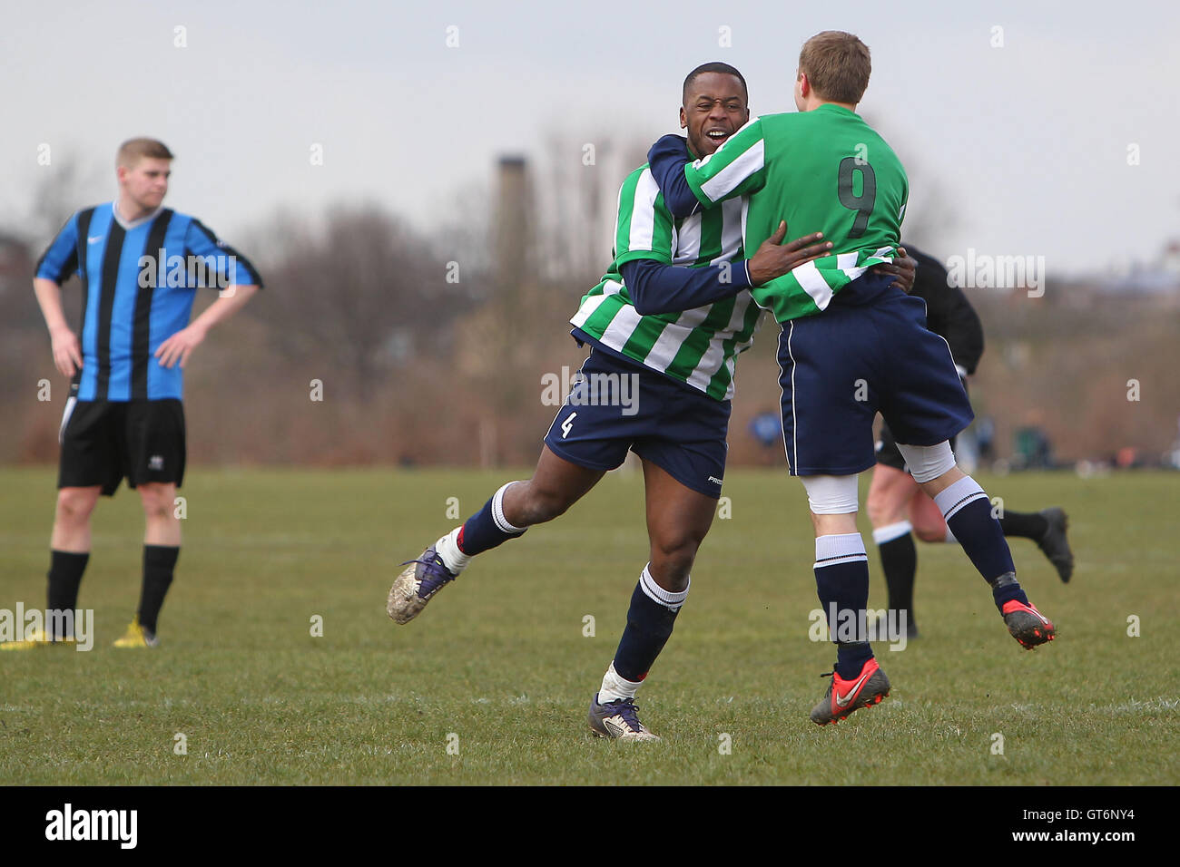 Phoenix score their fourth goal and celebrate - Phoenix (green/white ...