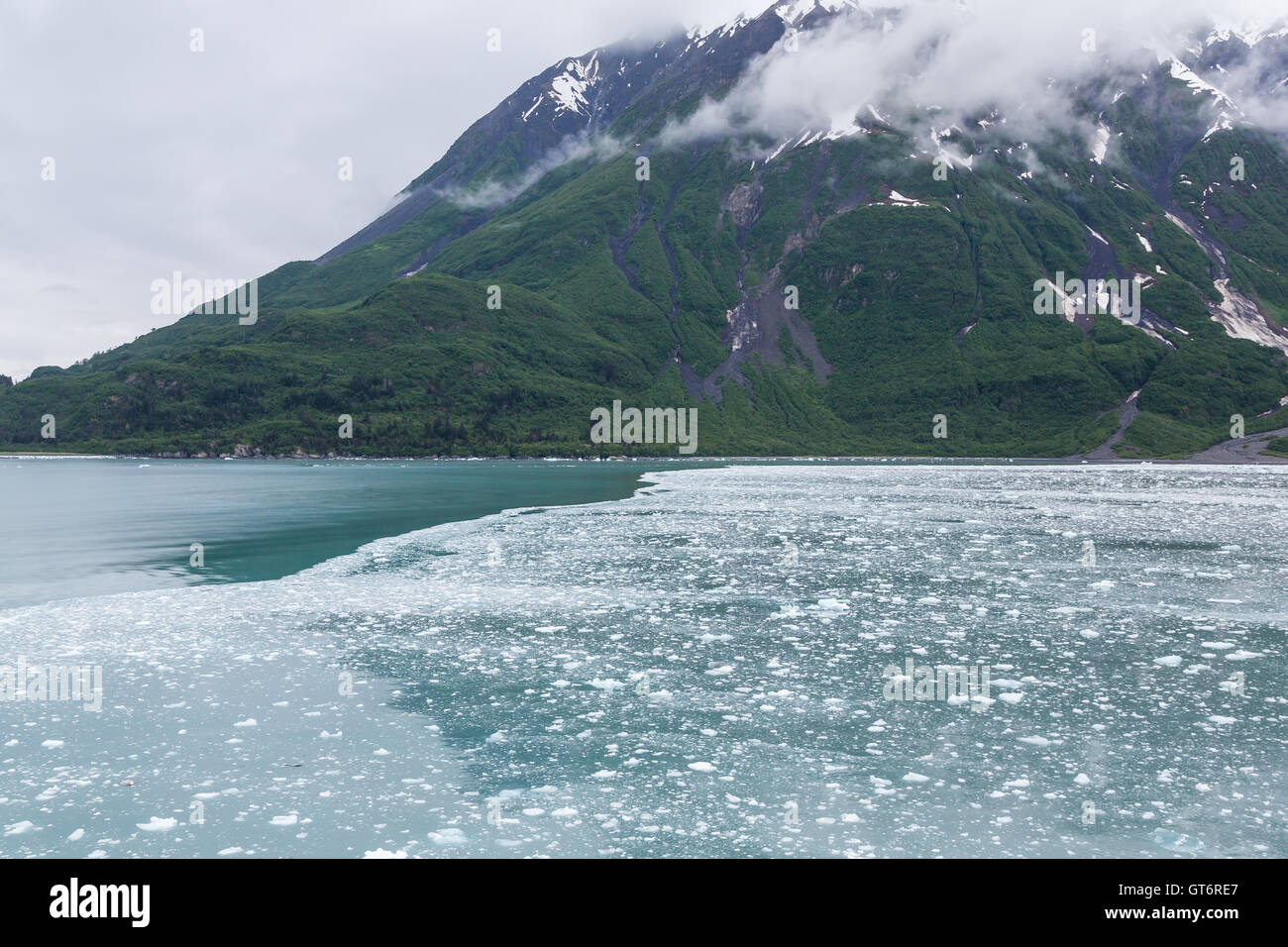 Snowy mountains off the icy waters of Alaska Stock Photo - Alamy