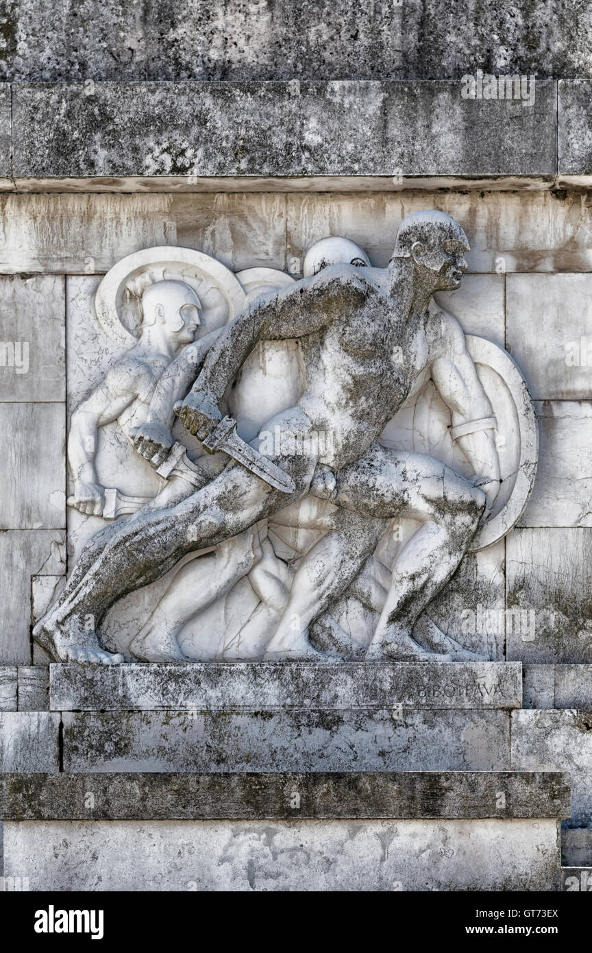 Bas-relief and sculpture of ancient Roman soldiers with war scenes ...