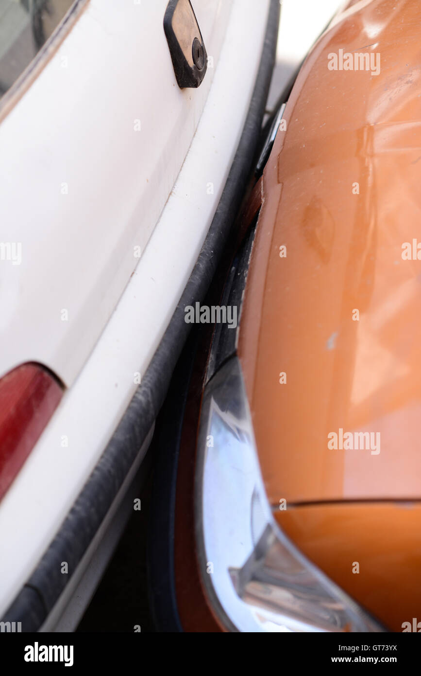 Cars parked too close to each other Stock Photo - Alamy