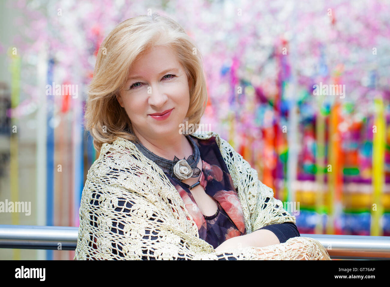 Close up facial portrait of a beautiful senior woman looking at the ...