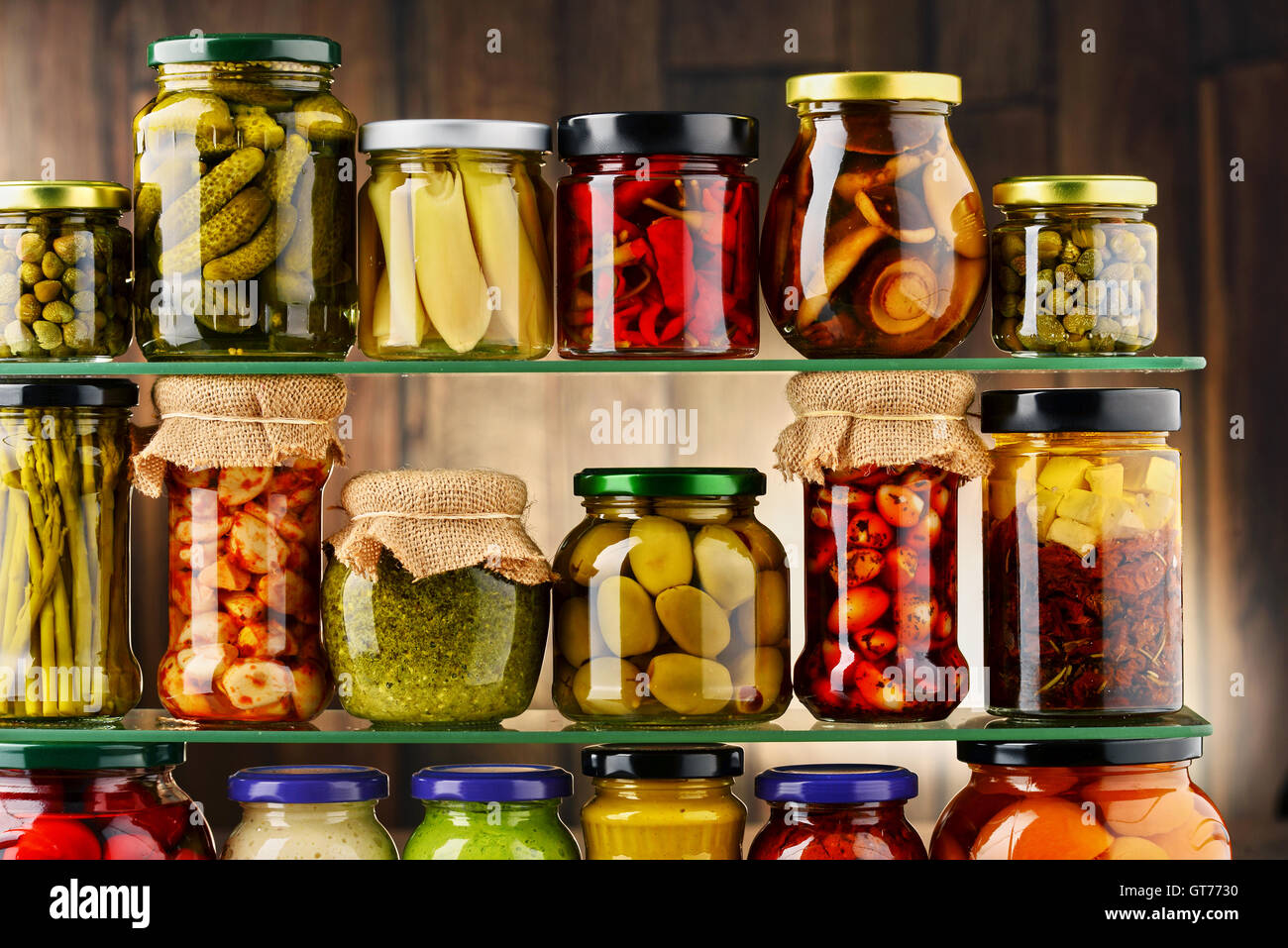 Jars with variety of pickled vegetables. Preserved food Stock Photo - Alamy