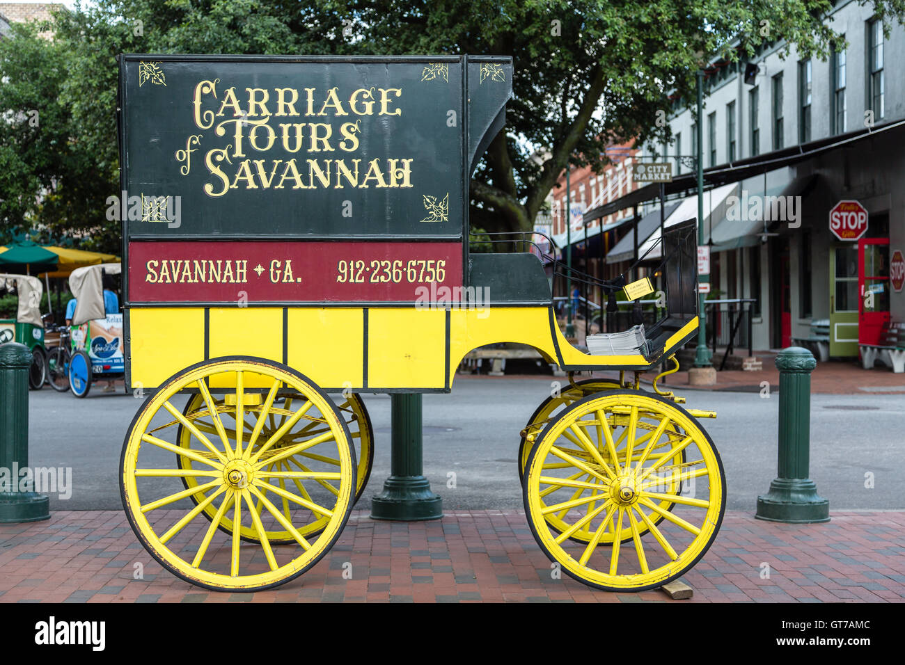Iconic yellow and green buggy for Carriage Tours of Savannah in Georgia ...