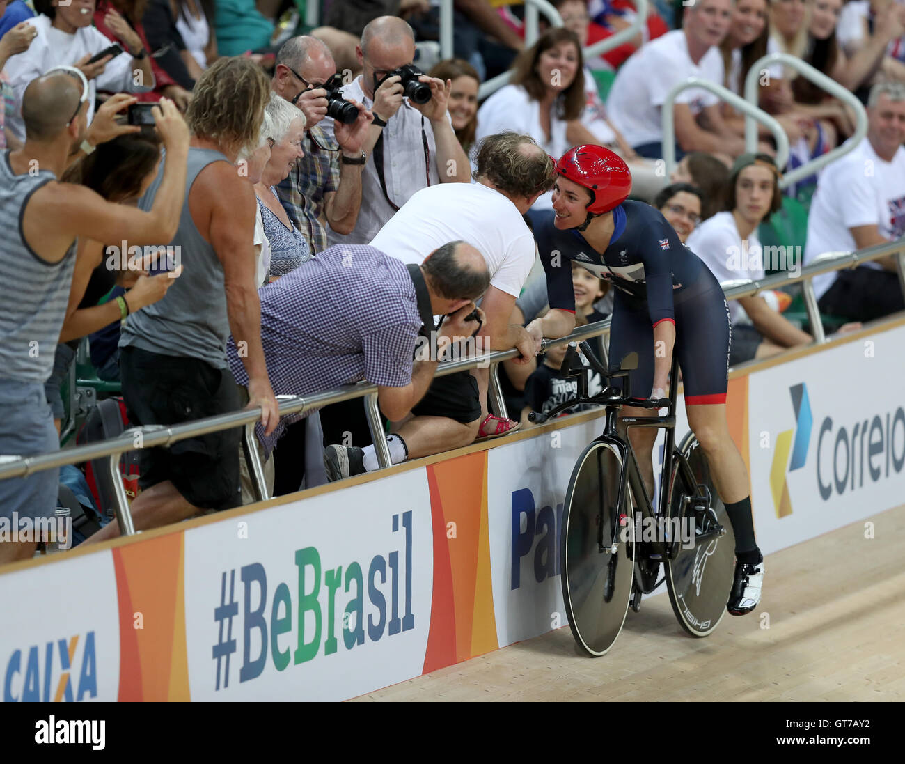 Great Britain's Sarah Storey greets her husband Barney and daughter ...