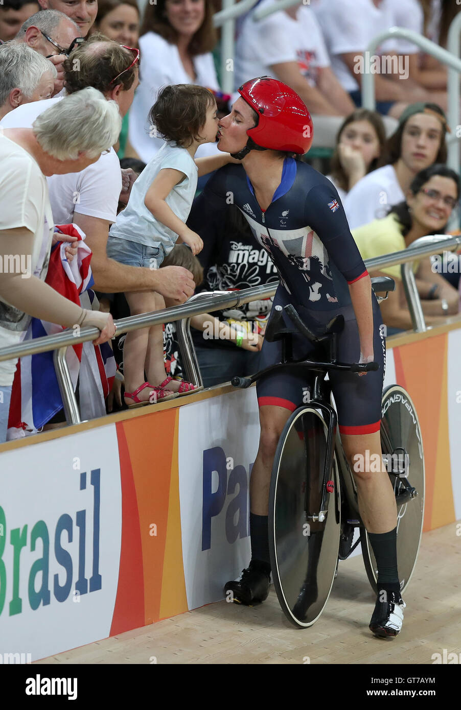 Great Britain's Sarah Storey greets her husband Barney and daughter ...