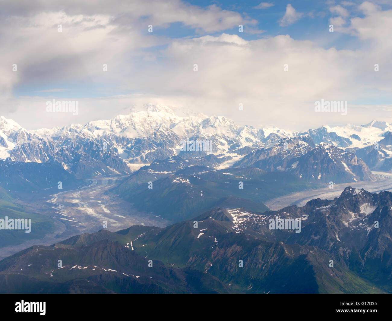 Aerial view of Denali (Mt. McKinley), the Tokositna Glacier (lower left ...