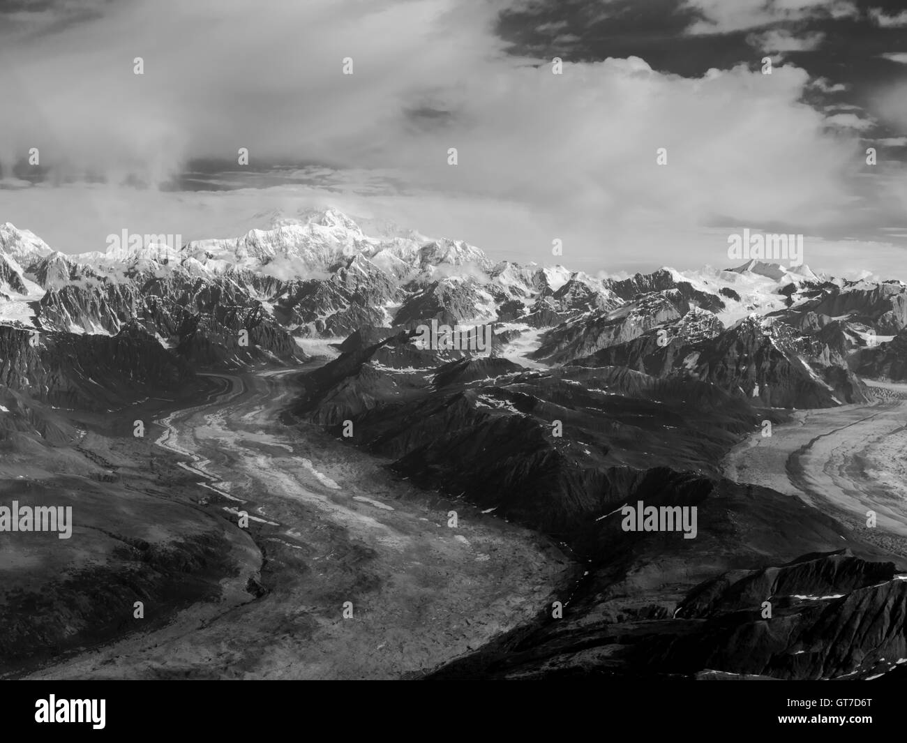 Aerial view of Denali (Mt. McKinley), the Tokositna Glacier (lower left ...