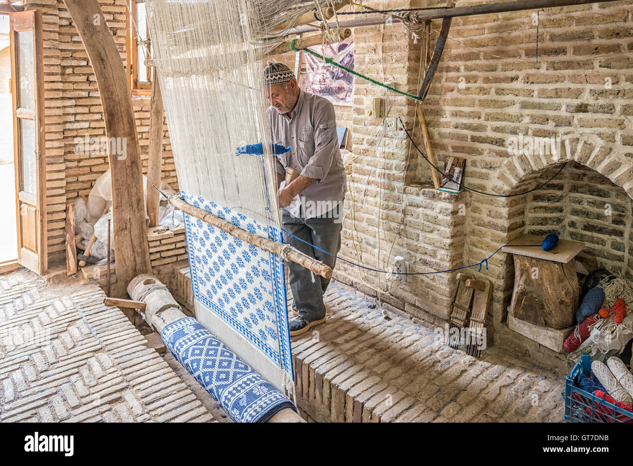 Ali Shirf Zade uses an ancient loom to weave traditional two-sided rugs ...