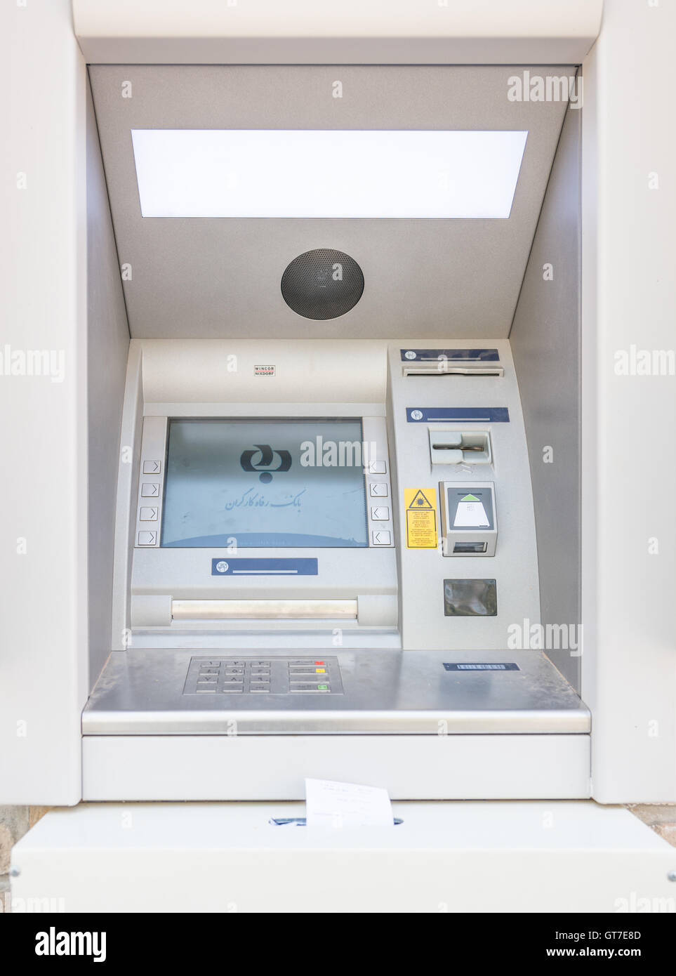 ATM machine with numbers and screen in Farsi Stock Photo - Alamy