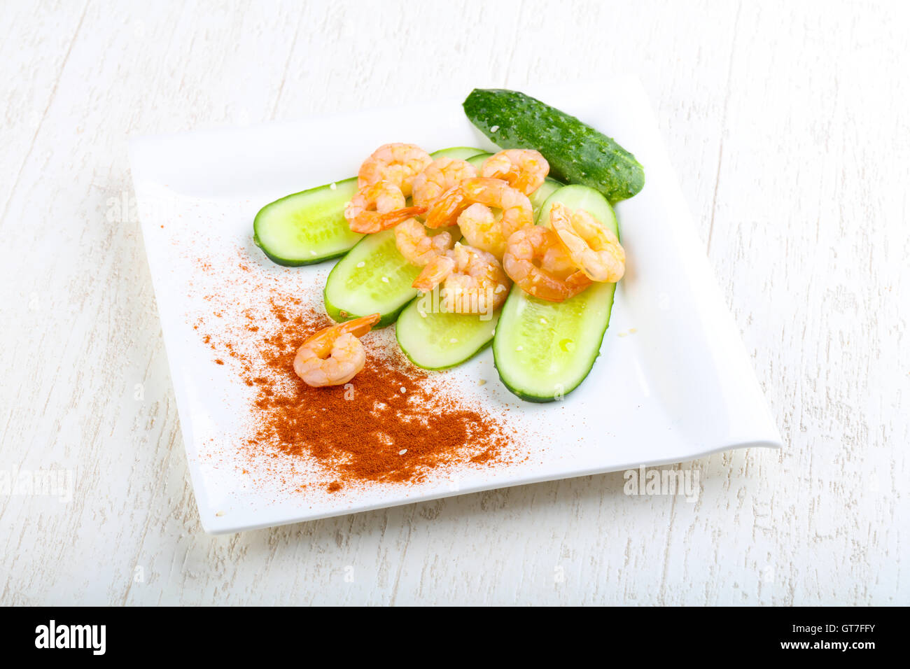 Prawn with cucumbers served sesame seeds Stock Photo - Alamy