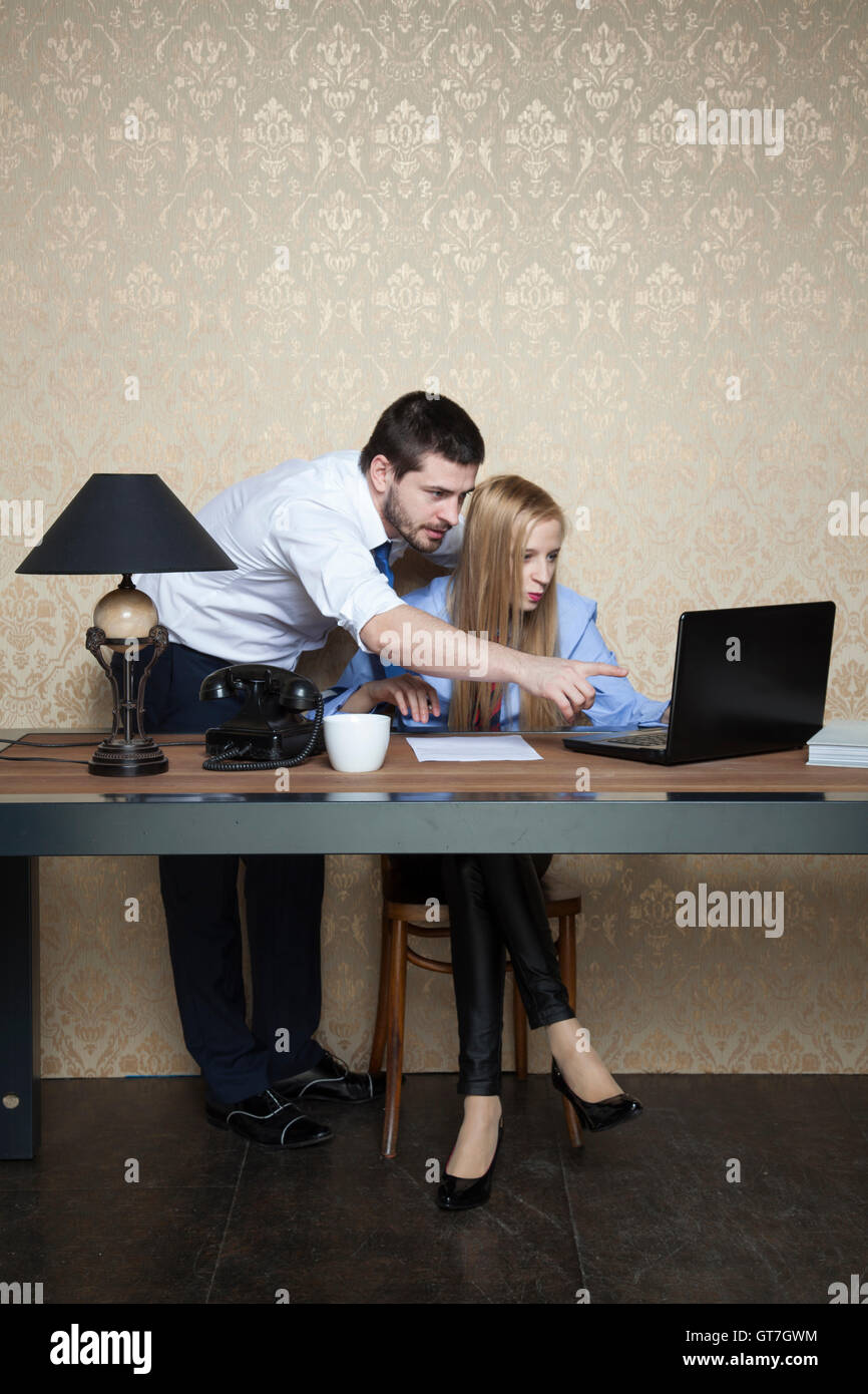 Cooperation in the office Stock Photo - Alamy