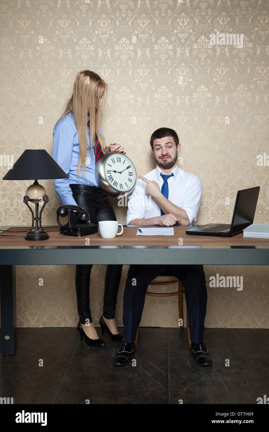 businessman pointing at the clock Stock Photo - Alamy