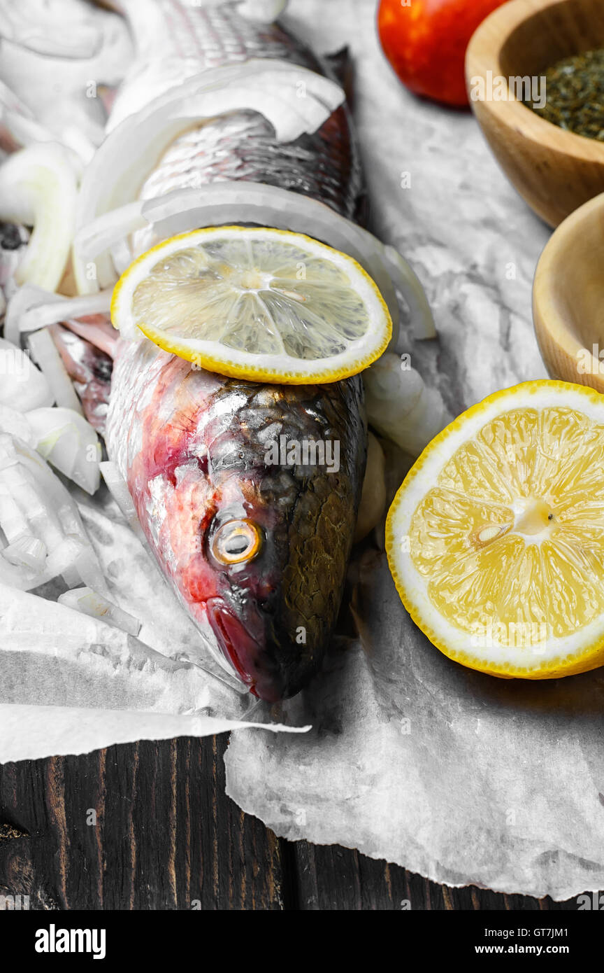 Two prepared for cooking fish with spices and seasonings Stock Photo ...