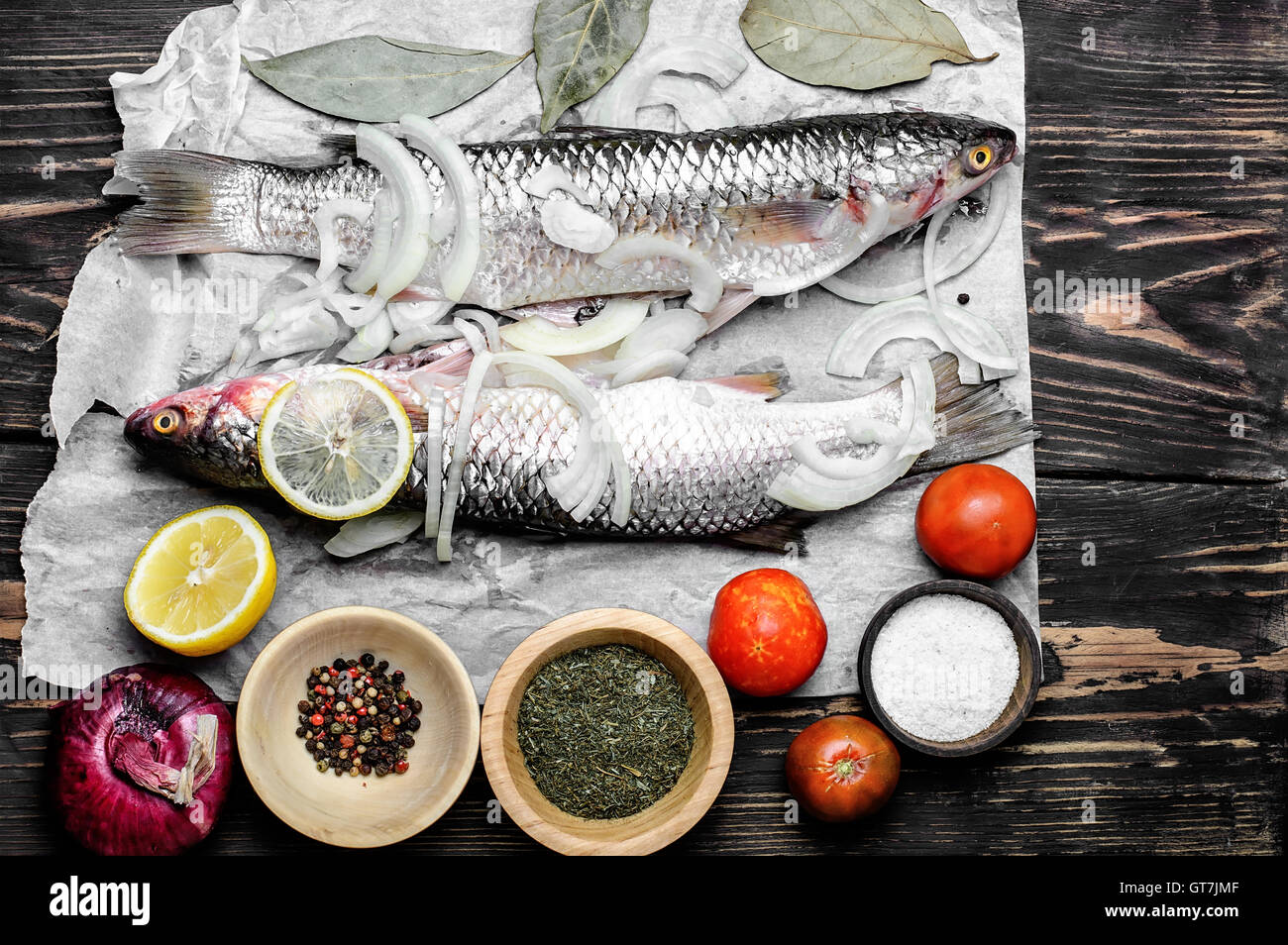 Two prepared for cooking fish with spices and seasonings Stock Photo ...