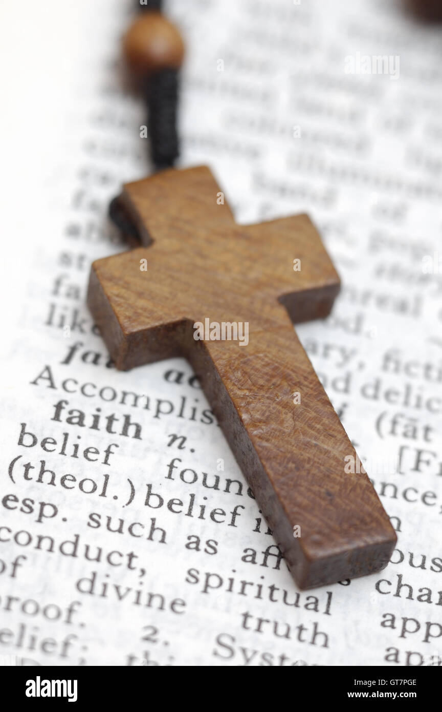 Cross on Dictionary Stock Photo - Alamy