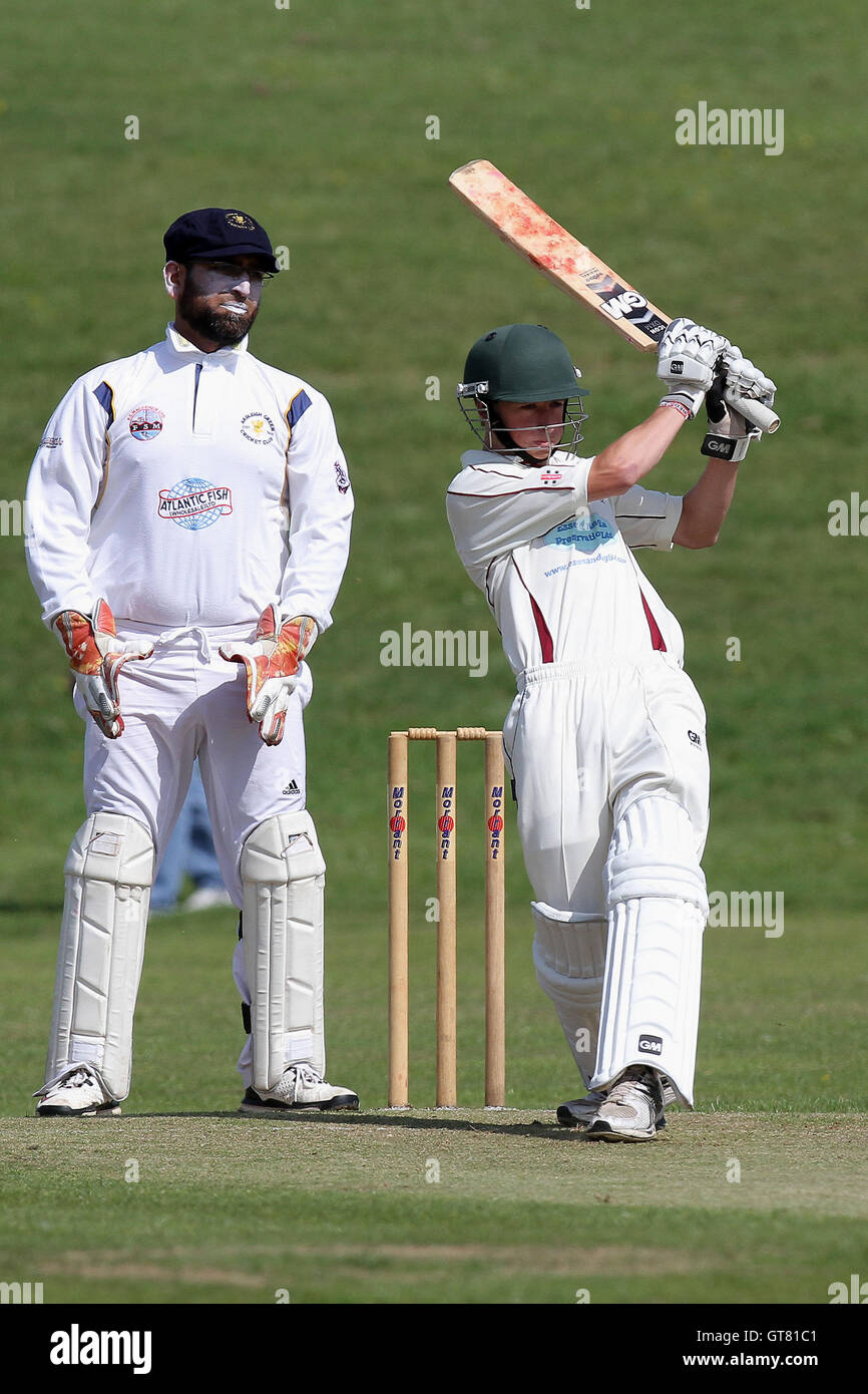 R Saunders in batting action for Brentwood as F Butt looks on behind ...